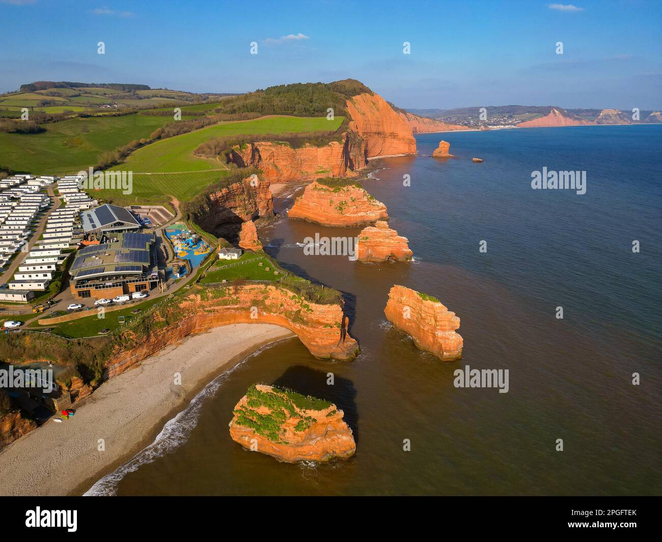 Aerial view of the sandstone rock pinnacles and cliffs at Ladram Bay ...