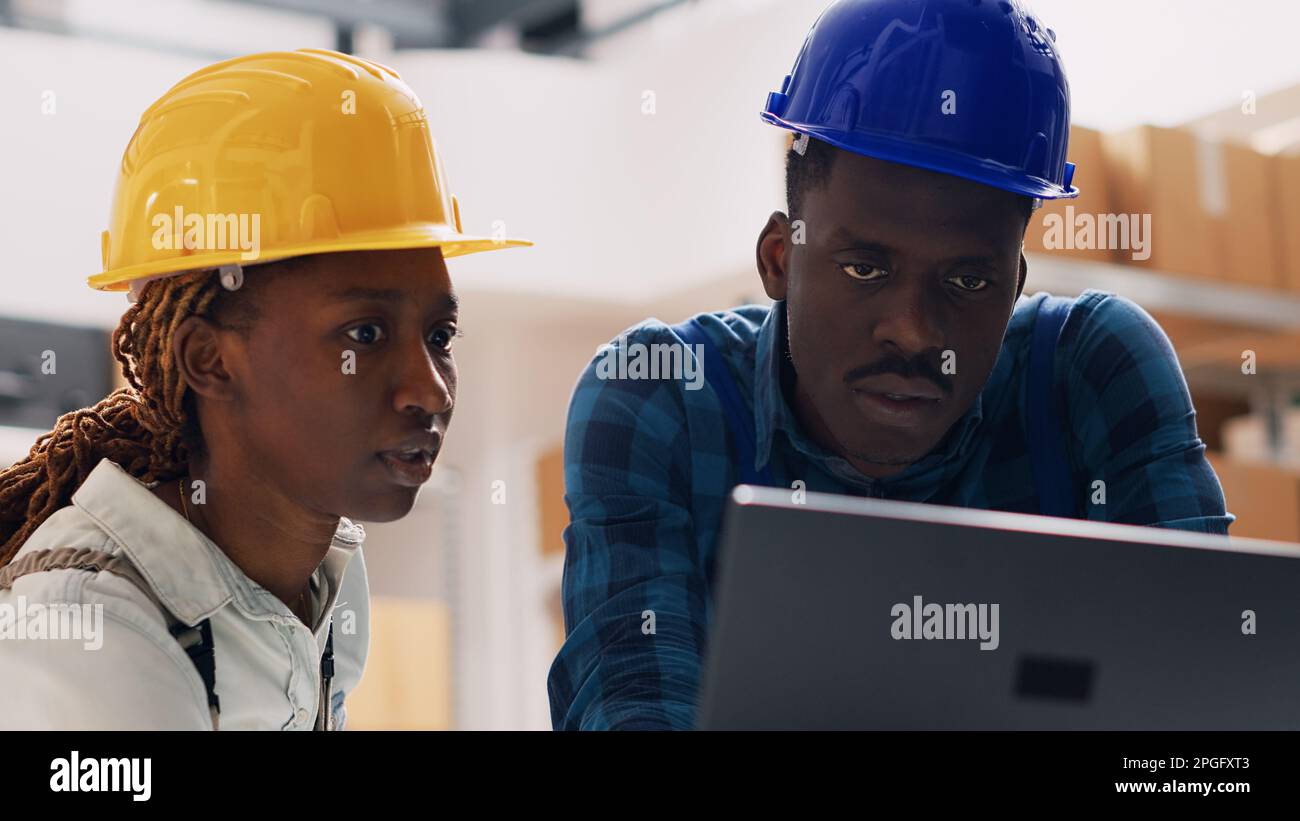 Diverse people in overalls reading hi-res stock photography and images ...