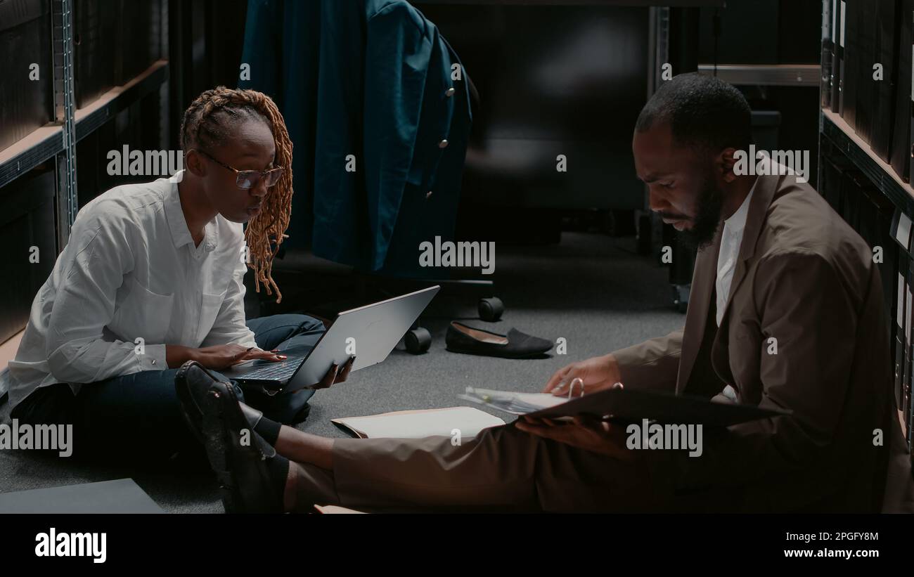 African american people working on police investigation case with ...