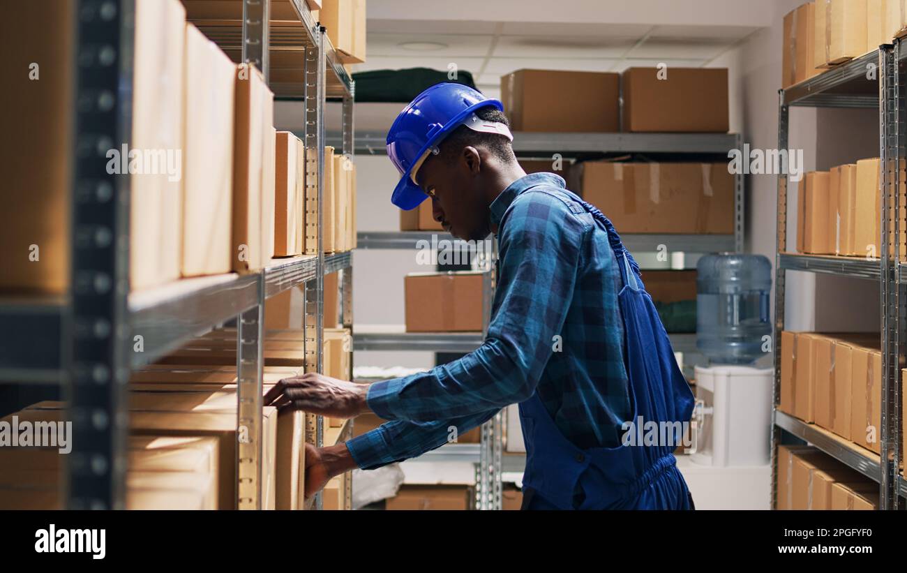 Team of diverse people scanning barcodes of products in storage room ...