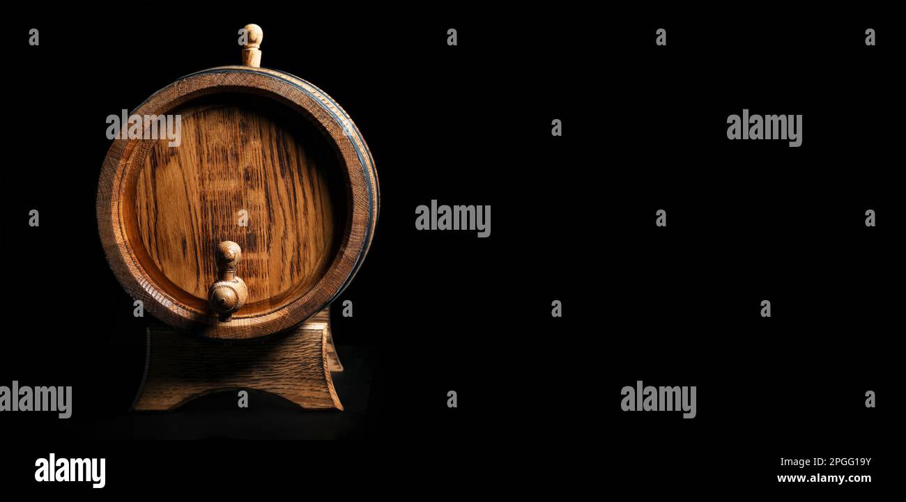 Wooden barrel on dark background with space for text Stock Photo - Alamy