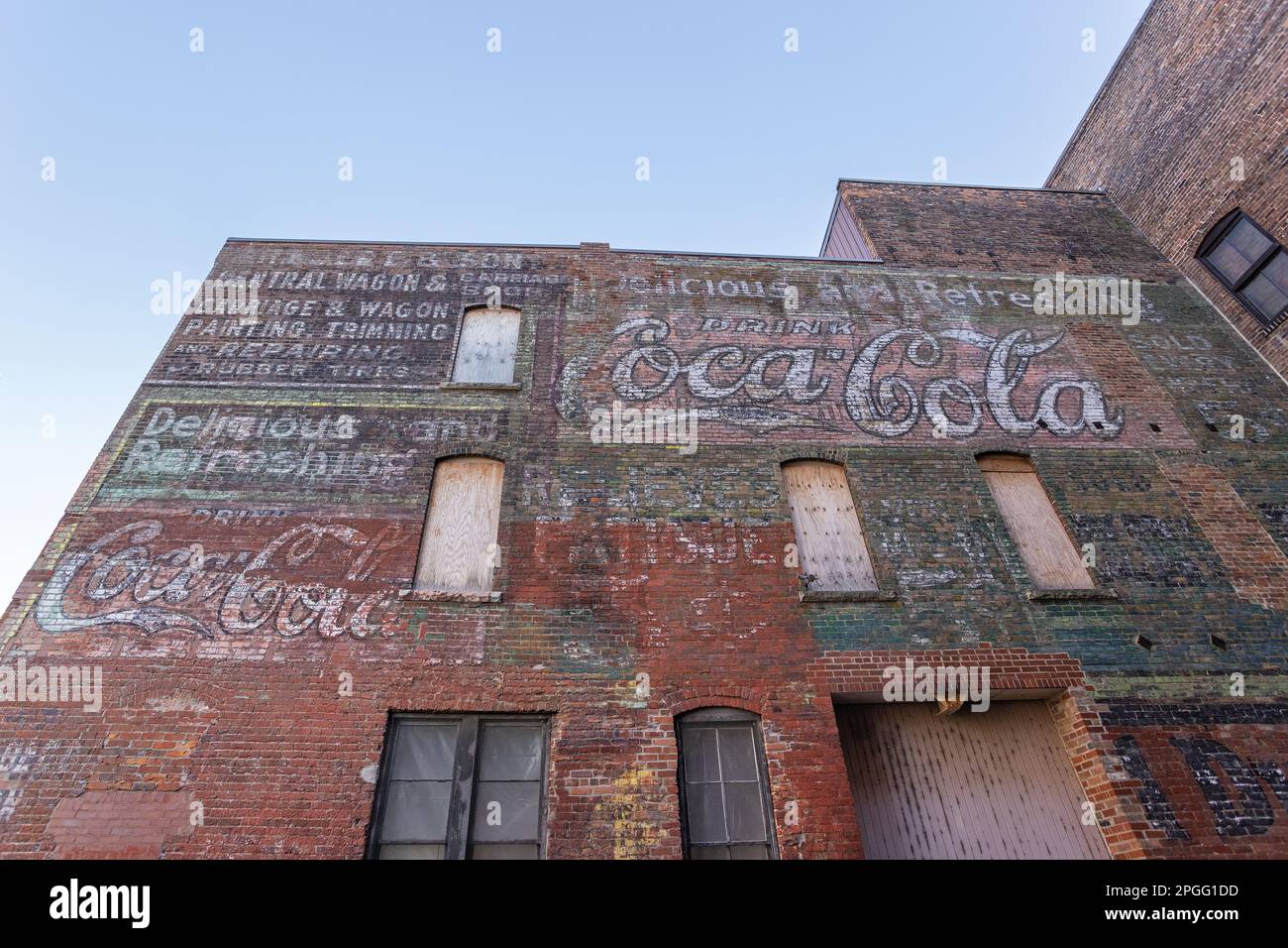 Classic hand painted Coca-Cola ghost sign on a brick wall in Burlington ...