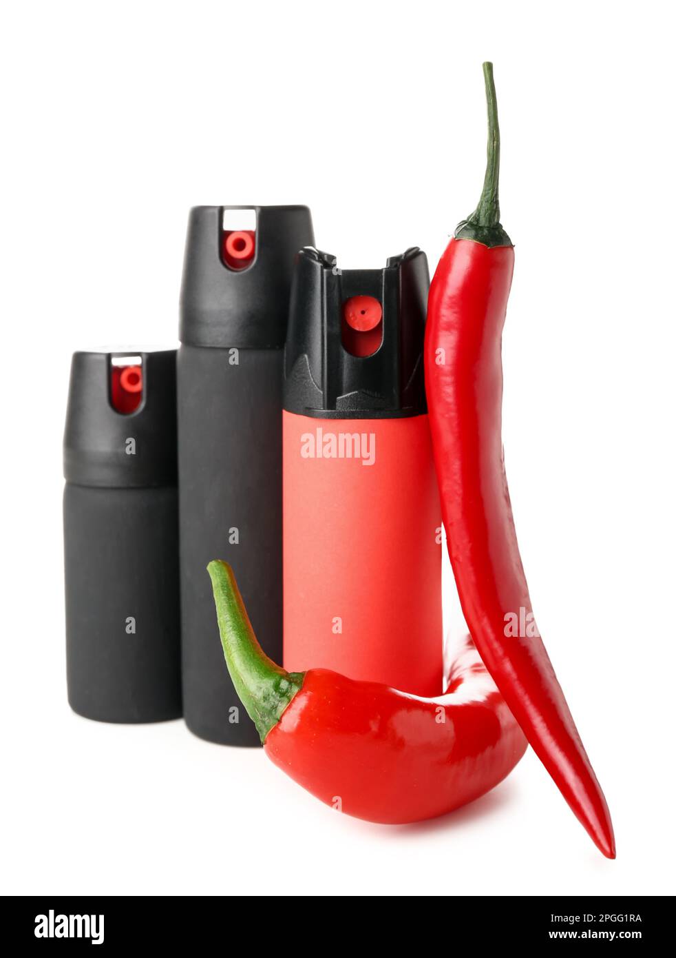 Sprays with chili peppers on white background Stock Photo - Alamy