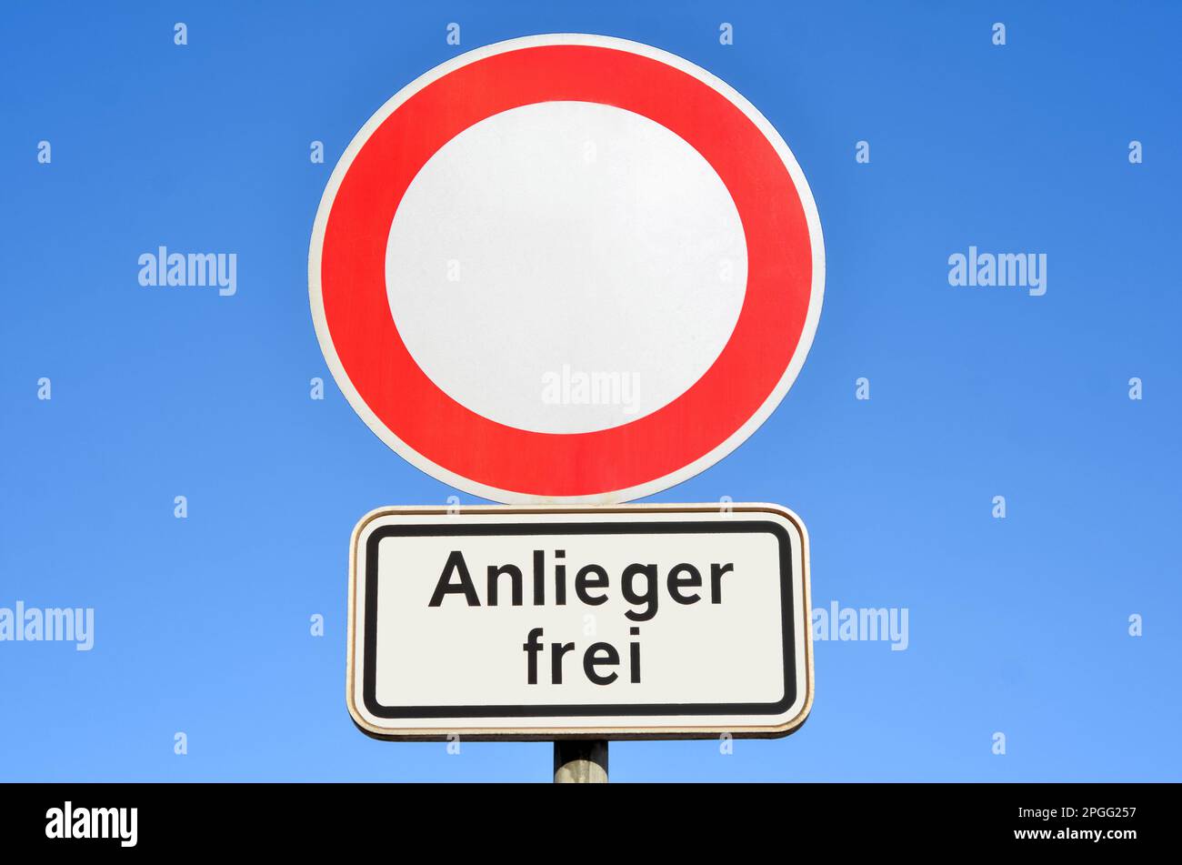 View of entry prohibited sign against blue sky, closeup Stock Photo - Alamy