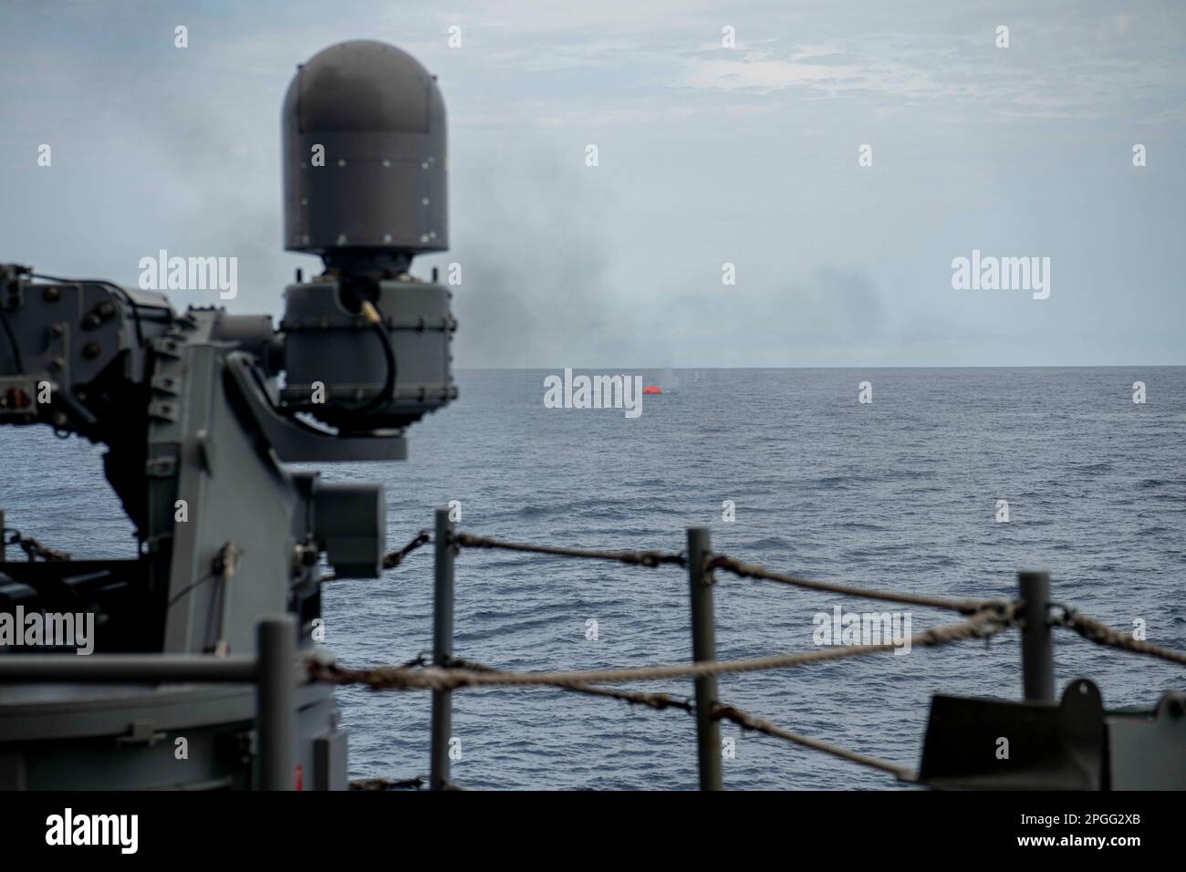 230322-N-ZQ263-1074 PHILIPPINE SEA (March 22, 2023) A 25 mm machine gun ...