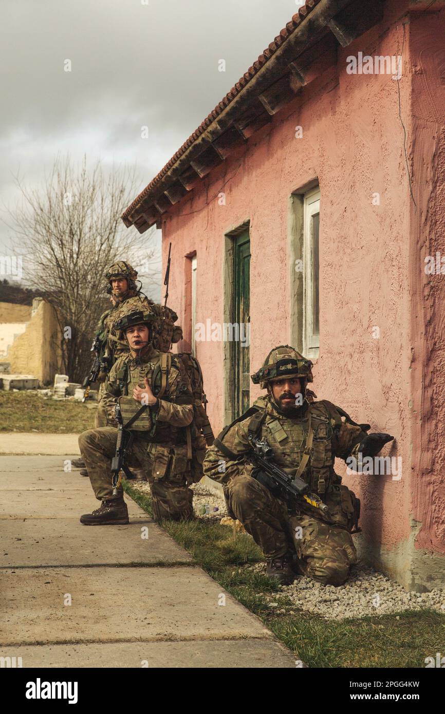 Cadets from the Royal Military Academy Sandhurst prepare to engage ...