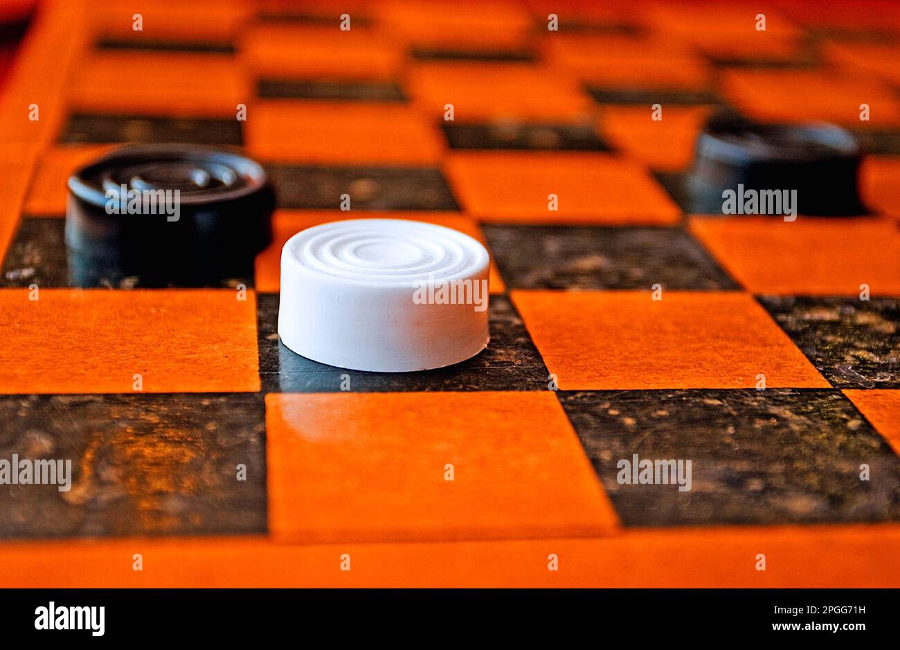 Two black checkers hi-res stock photography and images - Alamy