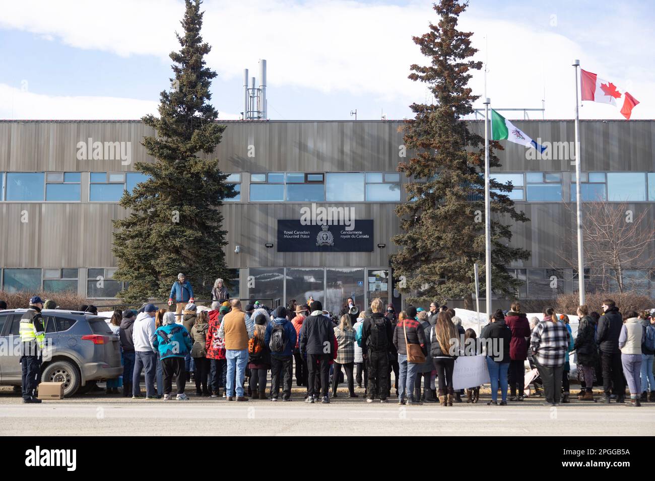 Whitehorse, Canada. 22nd Mar, 2023. People gather in front of RCMP ...