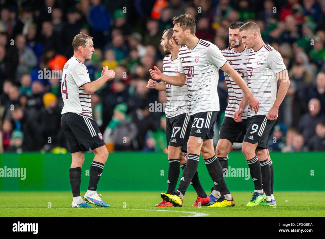 Dublin, Ireland. 22nd Mar, 2023. Roberts Uldrikis of Latvia celebrates ...