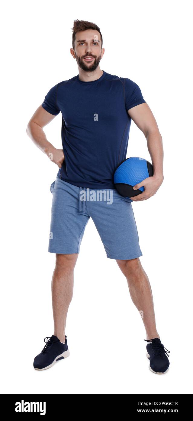 Athletic man with medicine ball isolated on white Stock Photo - Alamy