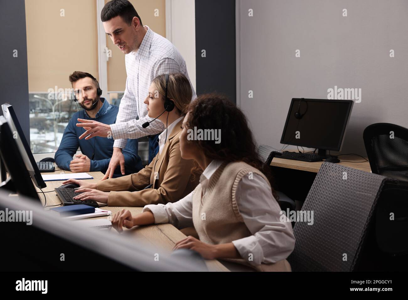 Computer operators in office hi-res stock photography and images - Alamy