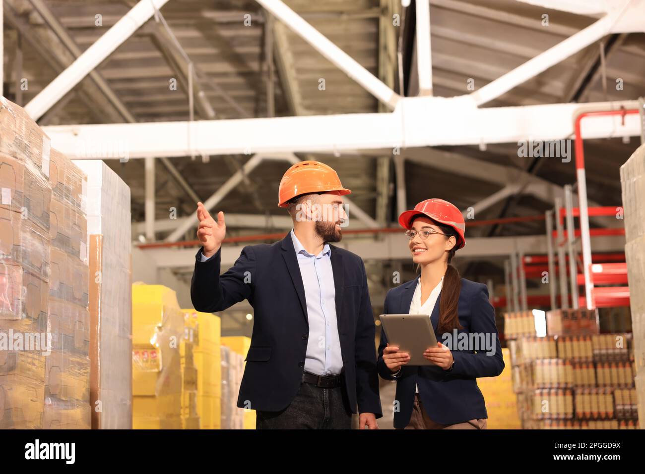 Manager and supervisor at warehouse. Logistics center Stock Photo - Alamy