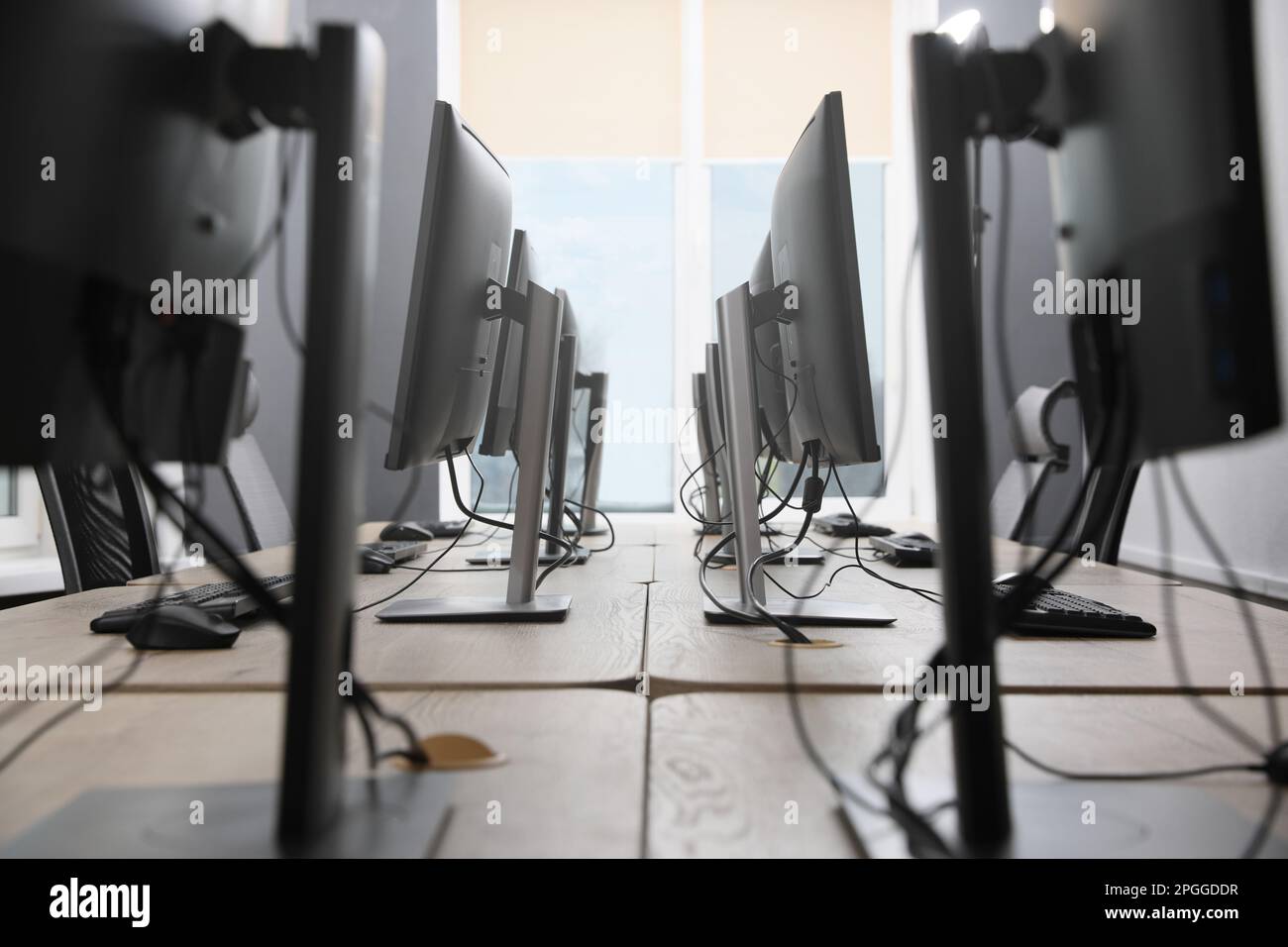 Many modern computers in open space office Stock Photo - Alamy