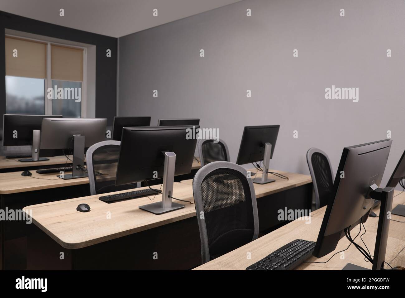 Rows of computers in empty office hi-res stock photography and images ...