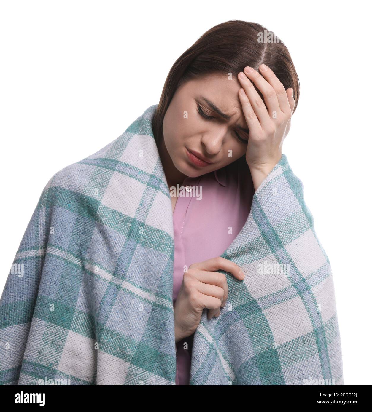 Woman wrapped in blanket suffering from cold on white background Stock ...