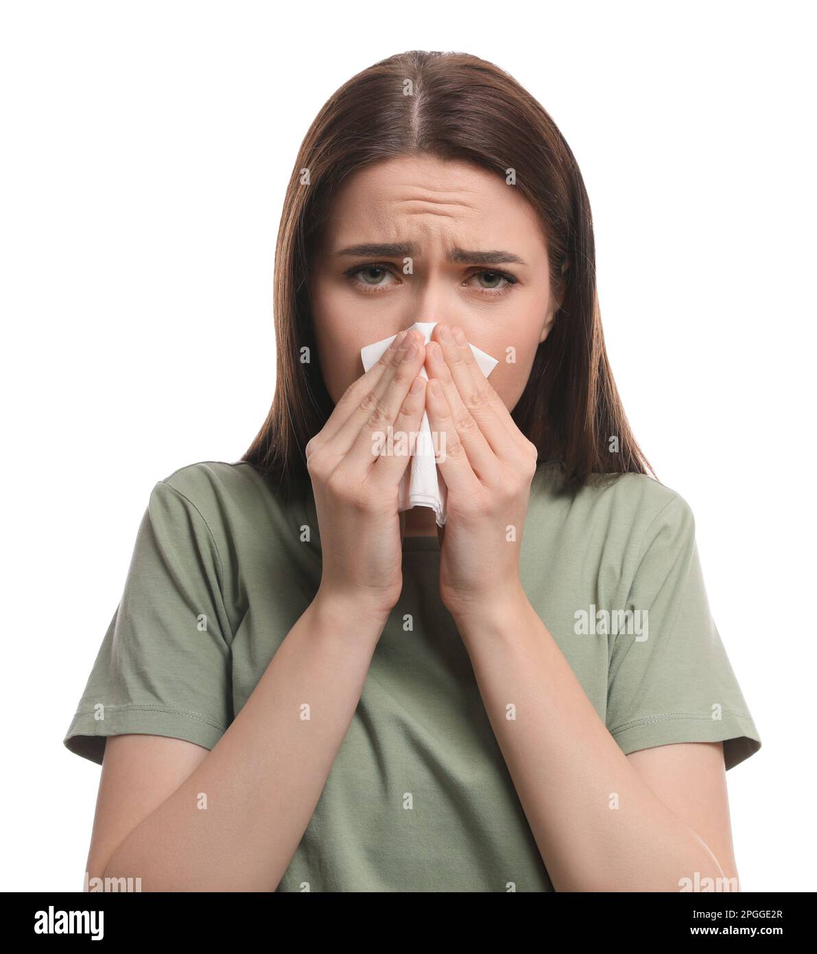 Woman blowing nose on white background. Cold symptoms Stock Photo - Alamy