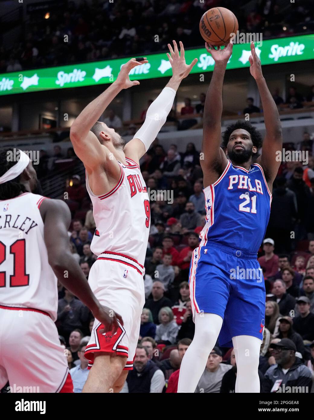 Philadelphia 76ers' Joel Embiid shoots over Chicago Bulls' Nikola ...