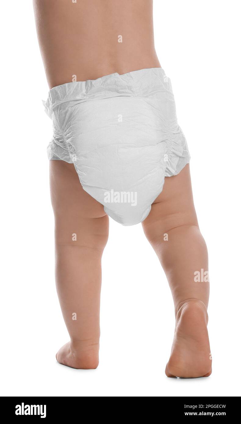 Cute baby in dry soft diaper standing isolated on white, closeup Stock ...