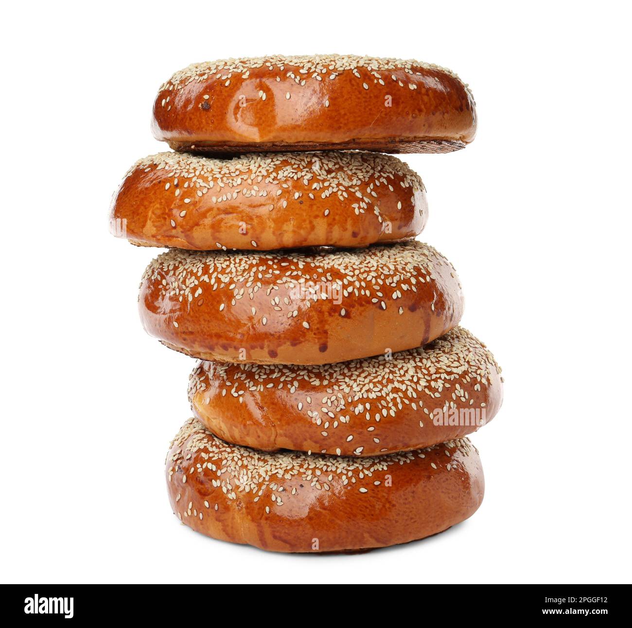 Many delicious fresh bagels on white background Stock Photo - Alamy