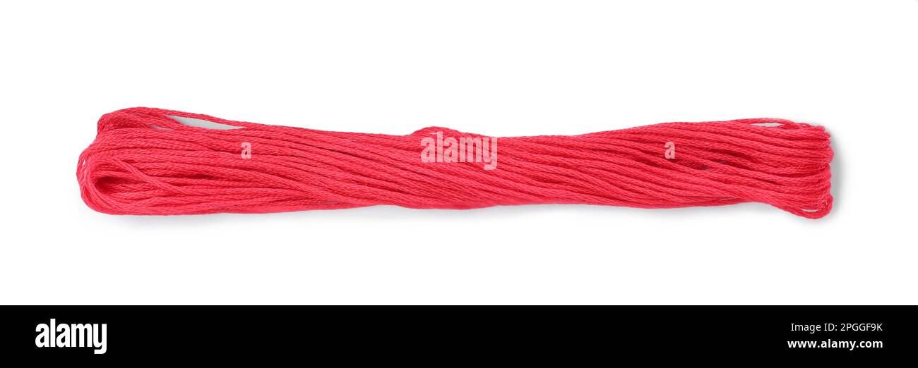 Light crimson embroidery thread on white background Stock Photo - Alamy