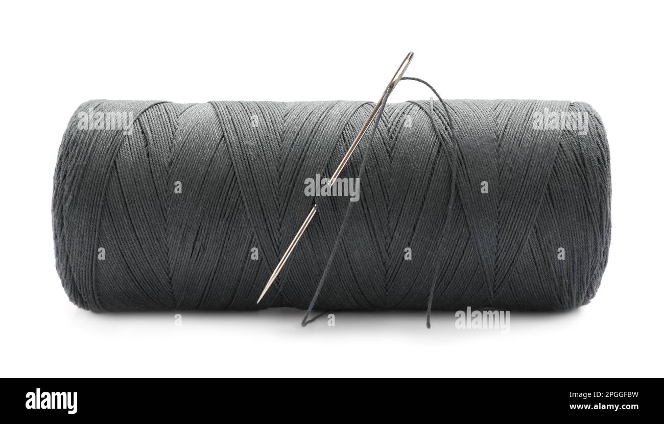 Black sewing thread with needle on white background Stock Photo - Alamy