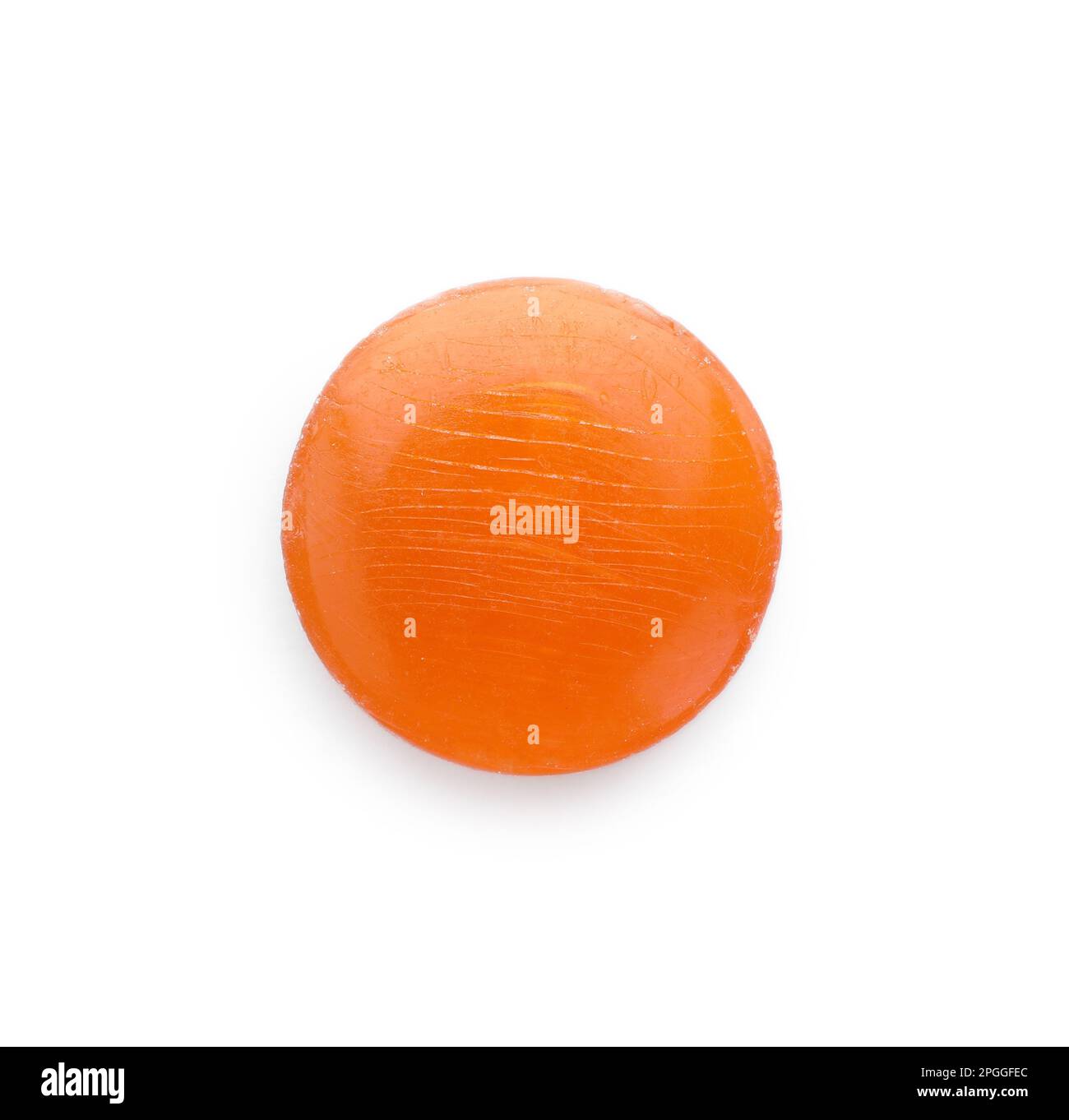 One orange cough drop isolated on white Stock Photo - Alamy
