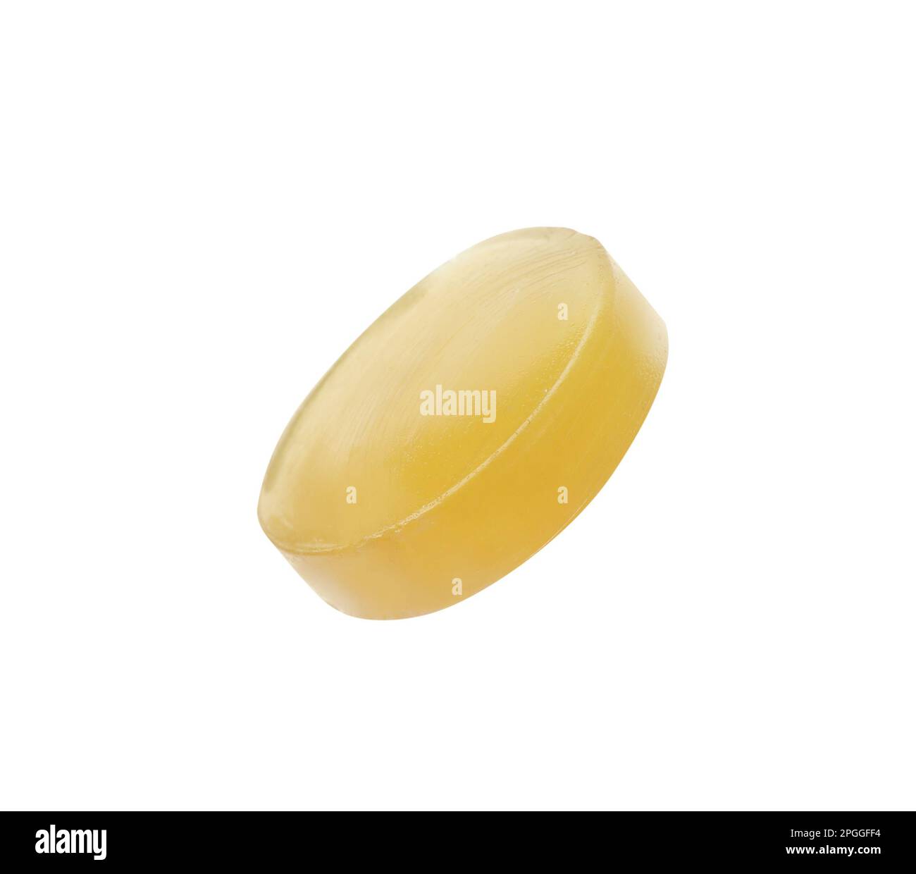 One yellow cough drop isolated on white Stock Photo - Alamy