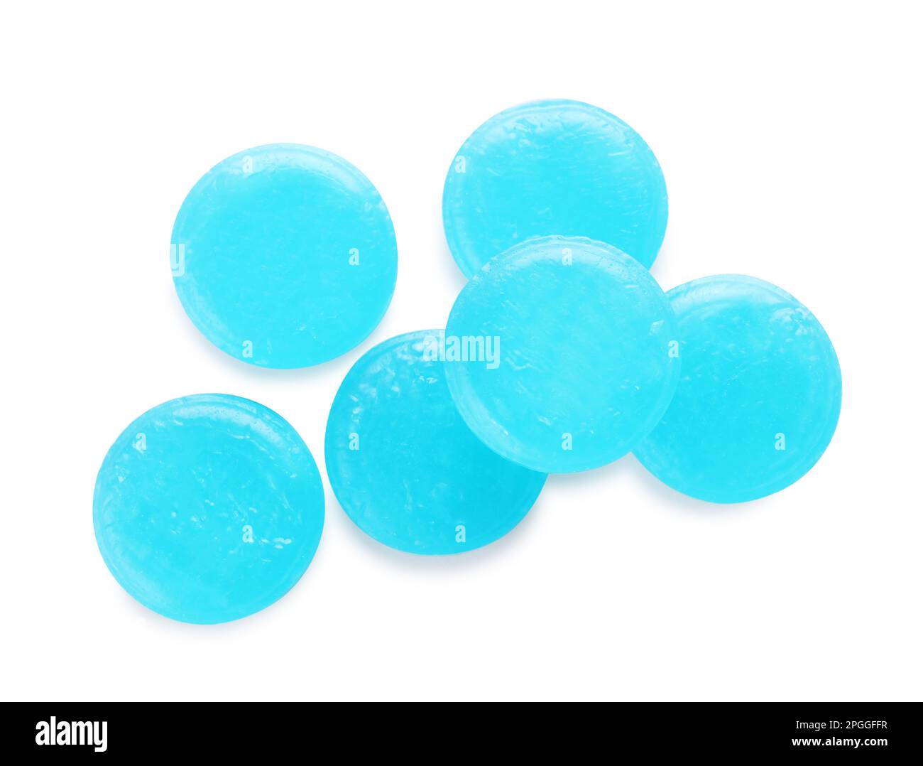 Many light blue cough drops on white background, top view Stock Photo ...