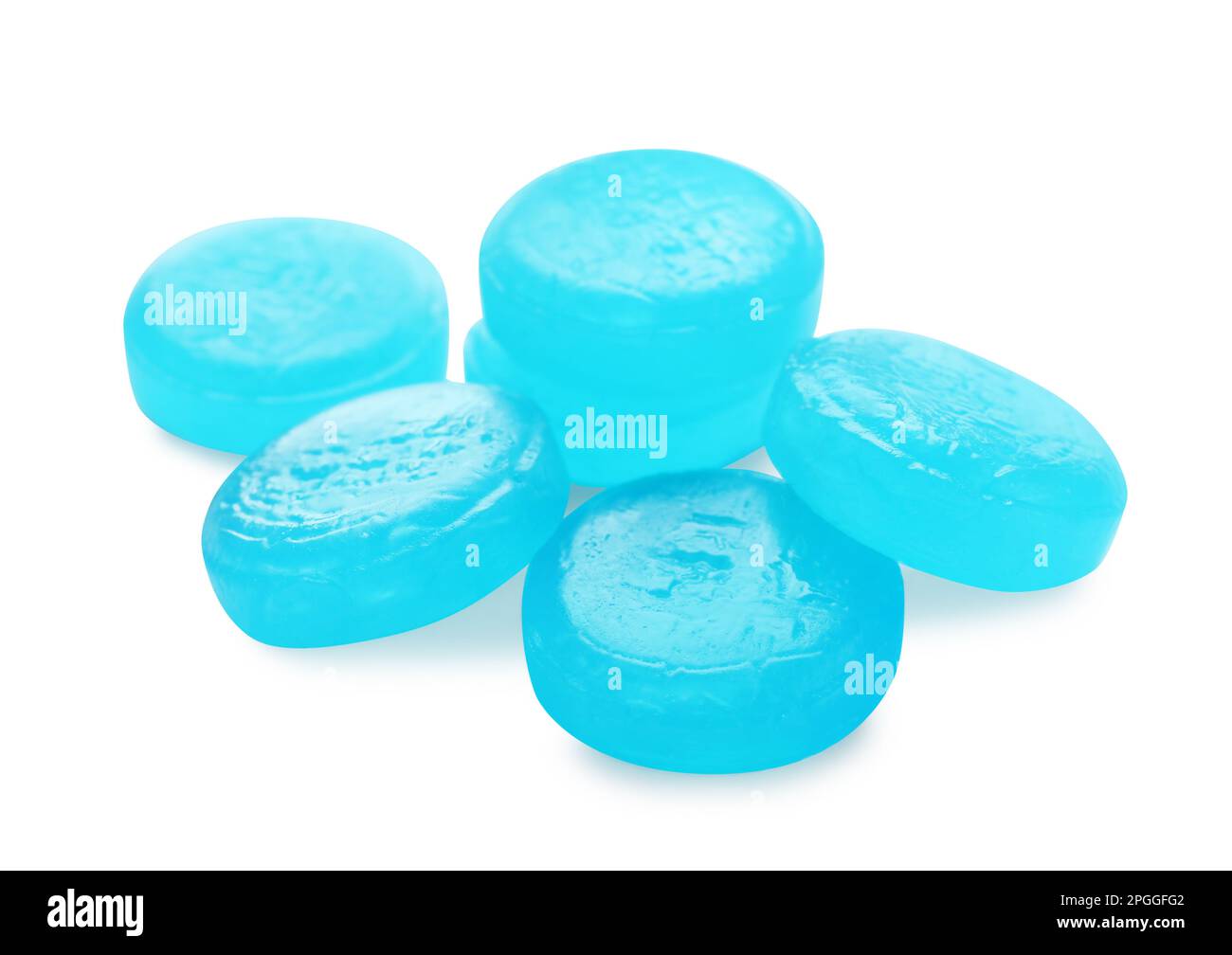 Many light blue cough drops on white background Stock Photo - Alamy