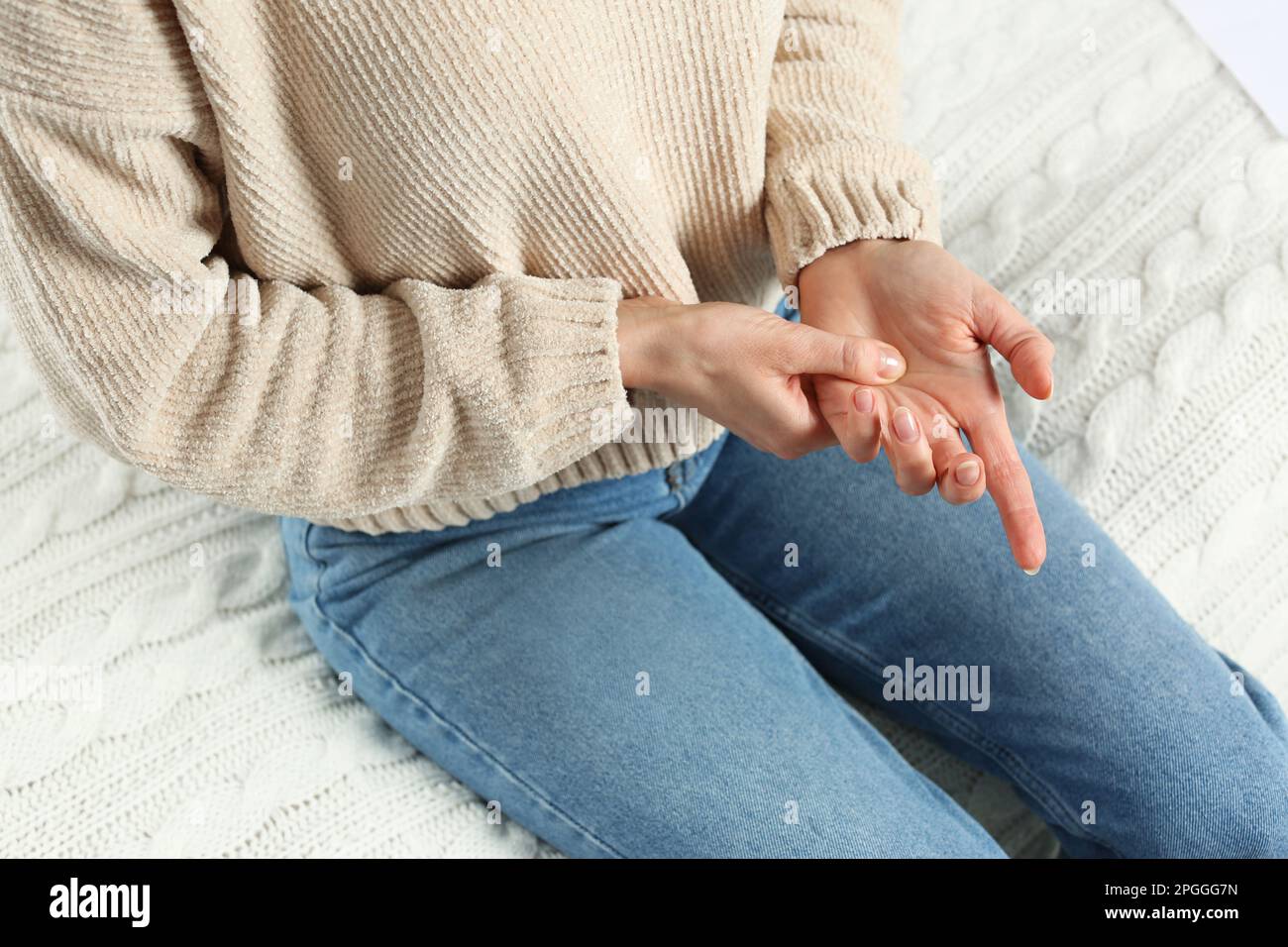 Woman suffering pain on finger hi-res stock photography and images - Alamy