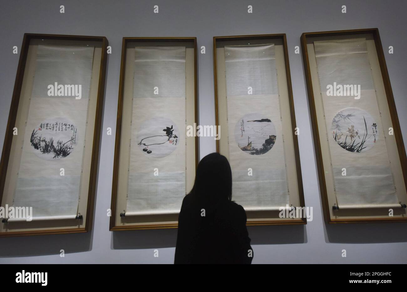 HANGZHOU, CHINA - MARCHA 23, 2023 - visitor looks at Pan Tianshou's ...