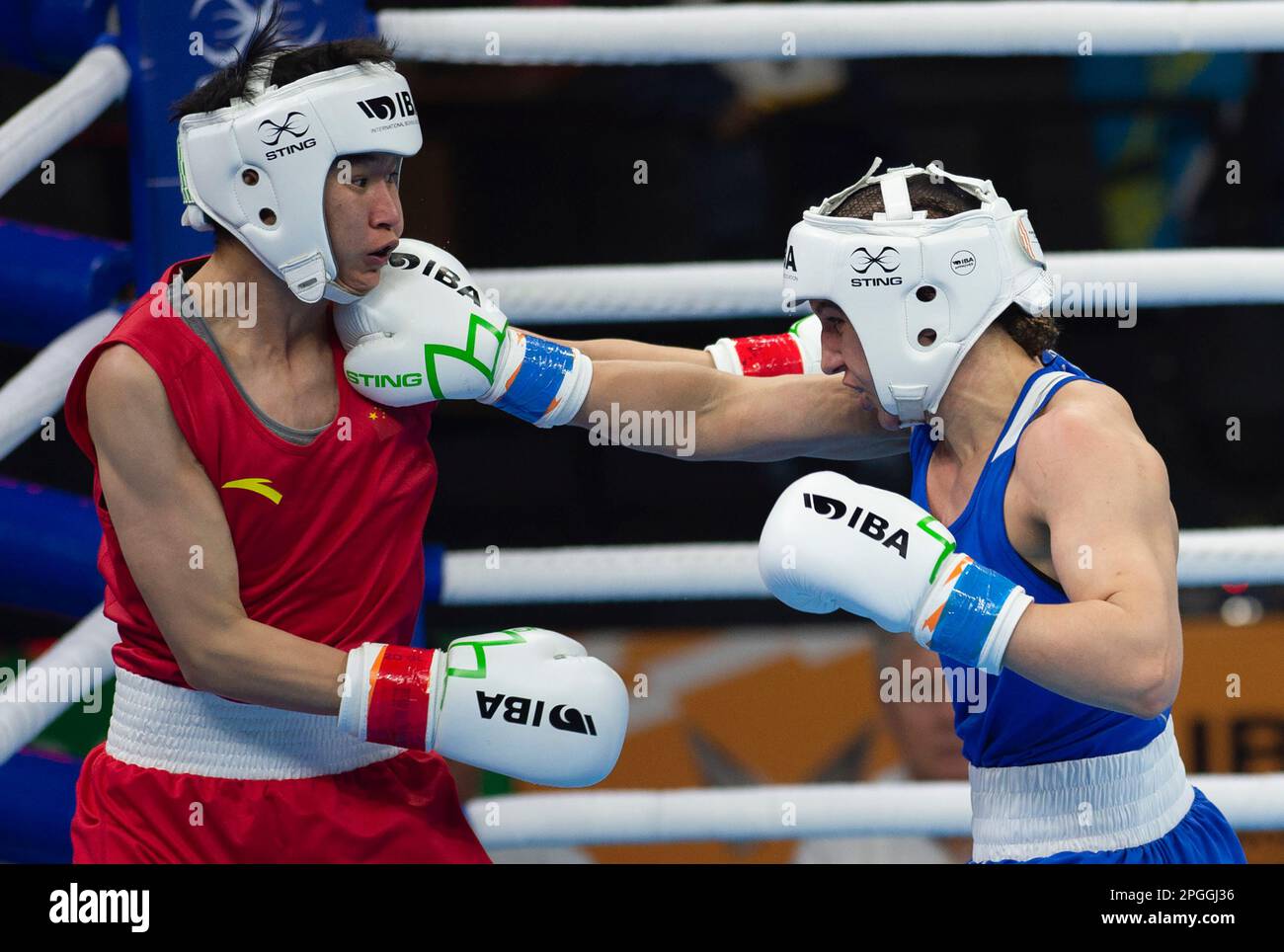 New Delhi, India. 22nd Mar, 2023. China's Yang Wenlu (L) competes with ...
