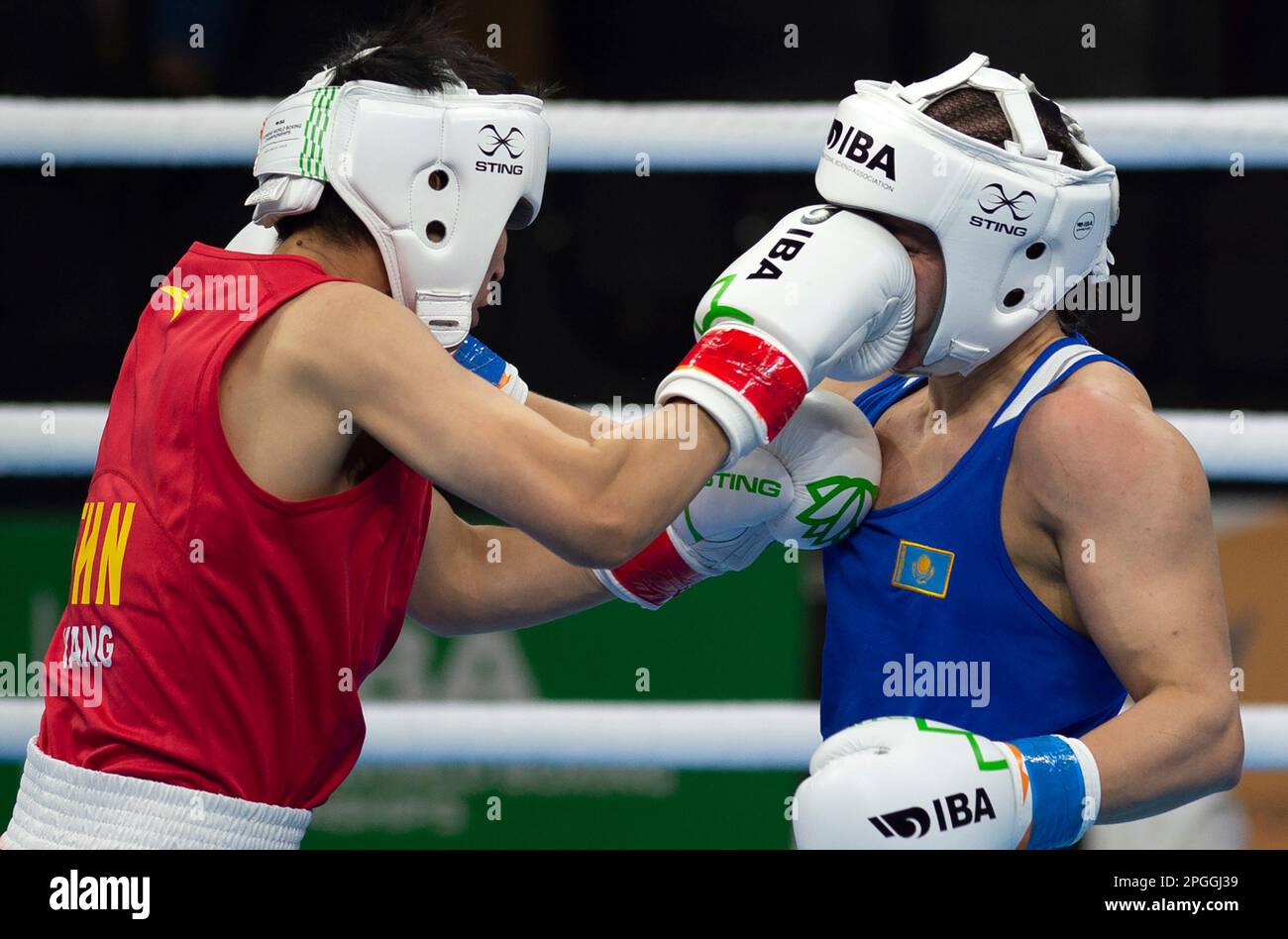 New Delhi, India. 22nd Mar, 2023. China's Yang Wenlu (L) competes with ...