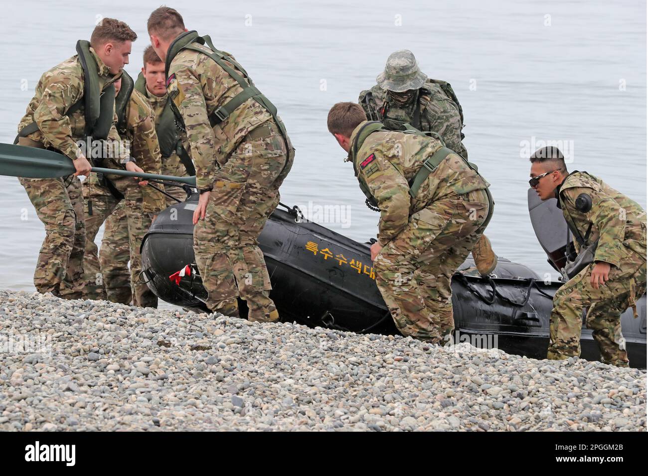 23rd Mar, 2023. S. Korea, U.S., British Marines hold joint infiltration ...