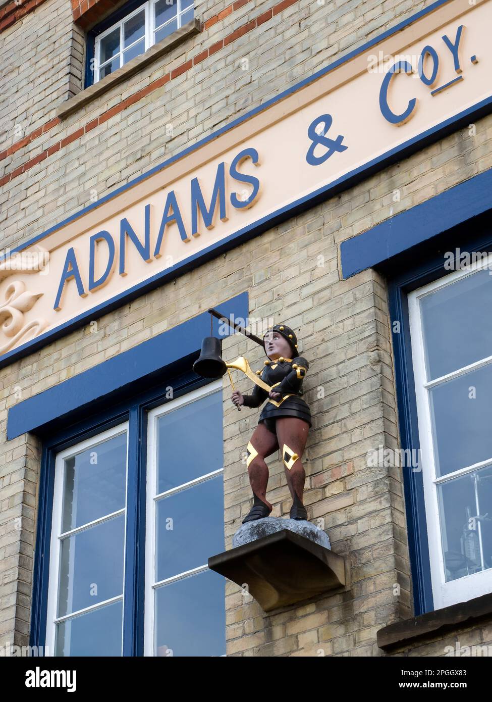 Statue of a Boy Hitting a Bell outside Adnam's Brewery in Southwold ...