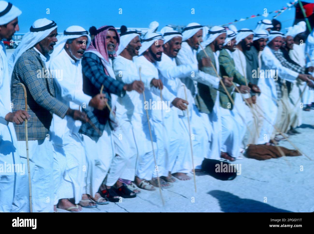 Arab elders dance on UAE National Day, Abu Dhabi, 1975 Stock Photo - Alamy