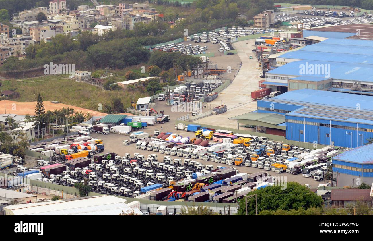 New trucks parking compound in an industrial area in Yuen Long, Hong ...