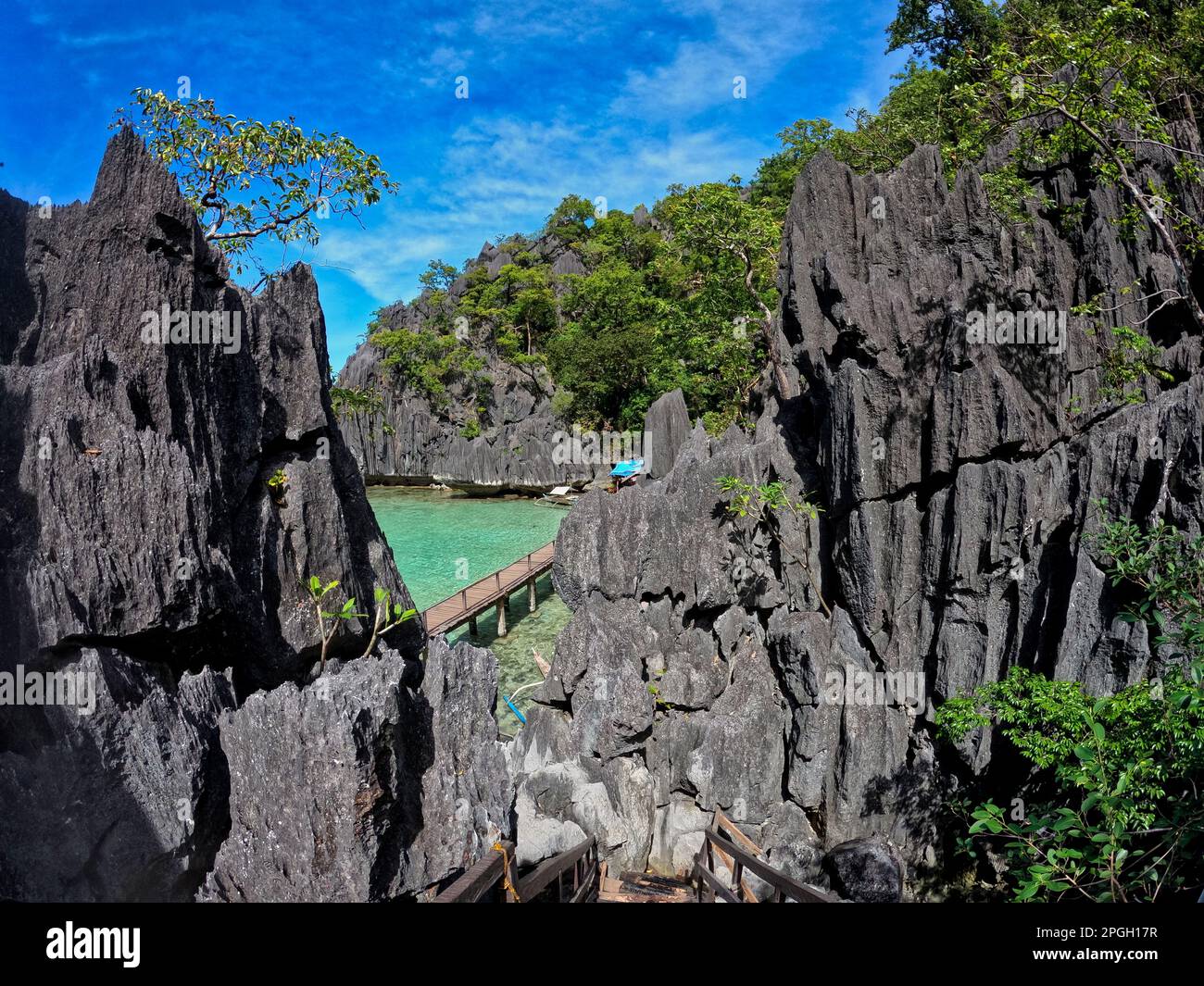 A bay with majestic rocks in Coron, Palawan in the Philippines that are ...