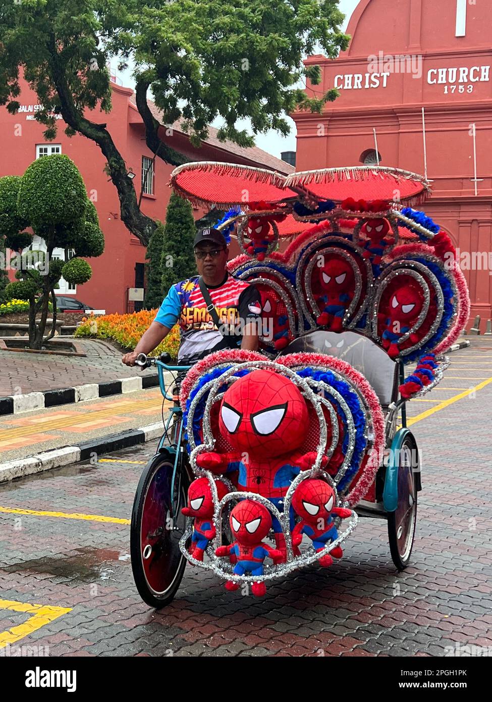 Malakka, Malaysia. 05th Mar, 2023. A rickshaw driver drives his pimped ...