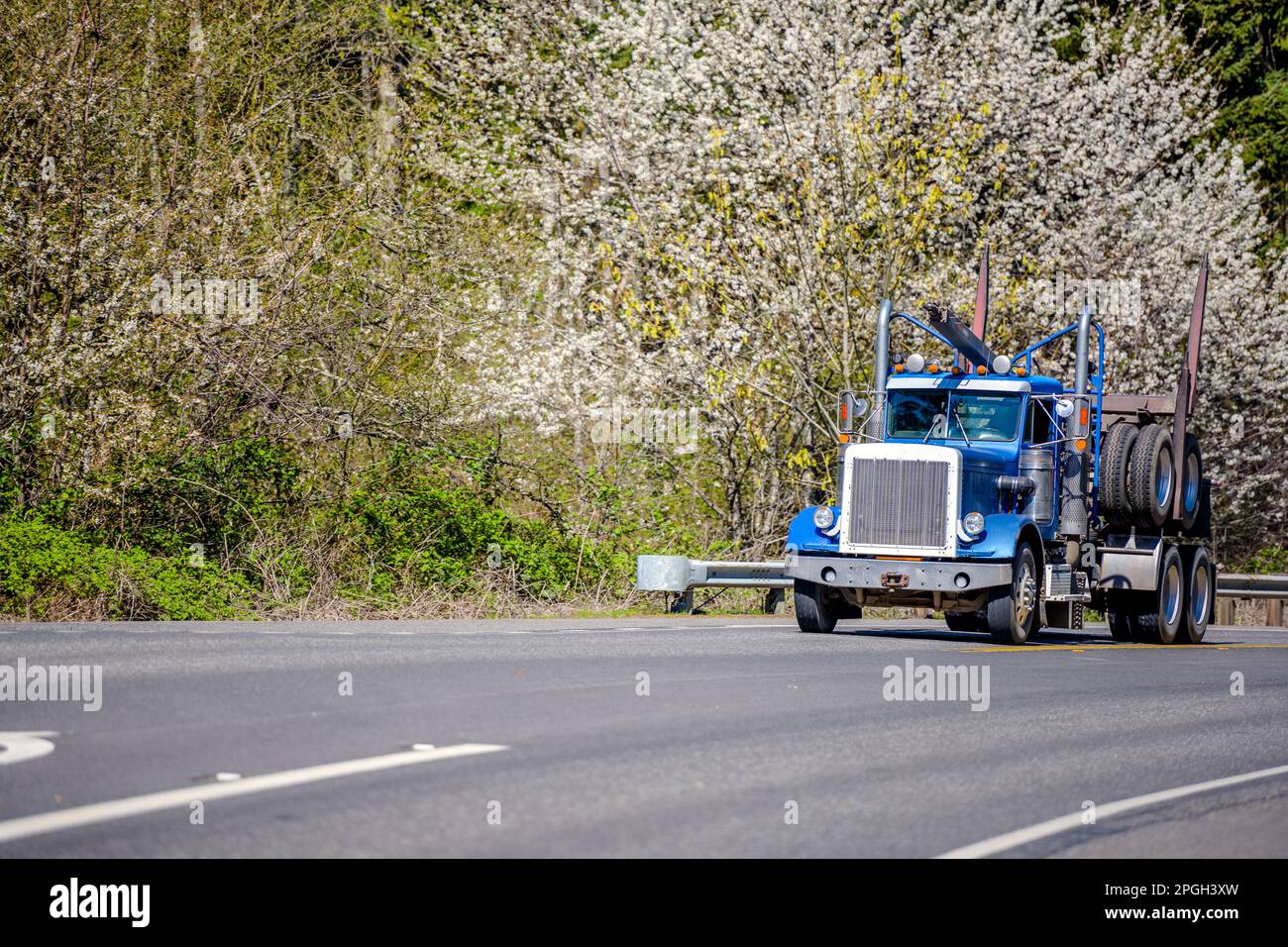 Industrial powerful bonnet big rig classic blue semi truck tractor with ...