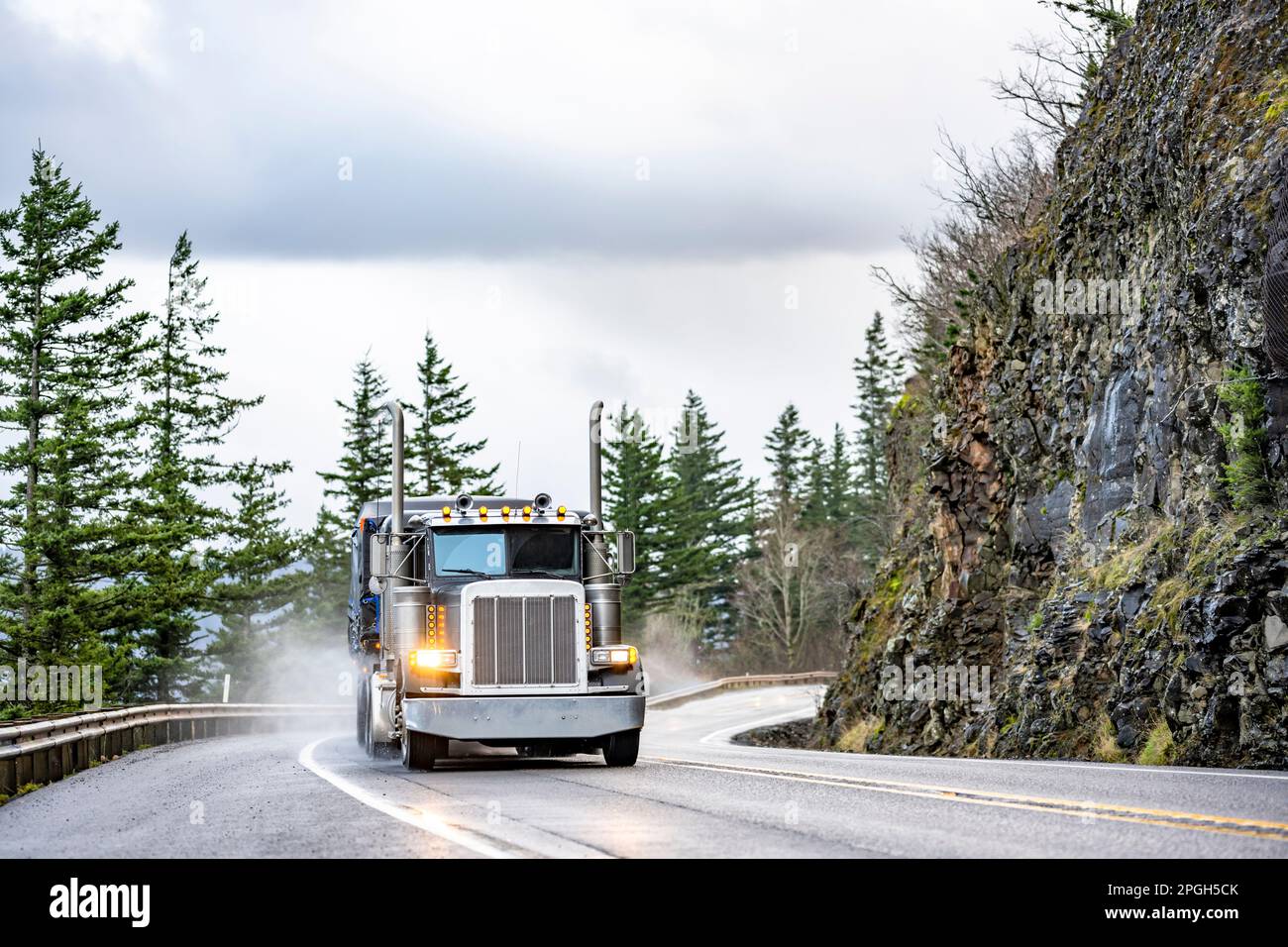 Industrial big rig classic blue semi truck tractor with tall exhaust ...
