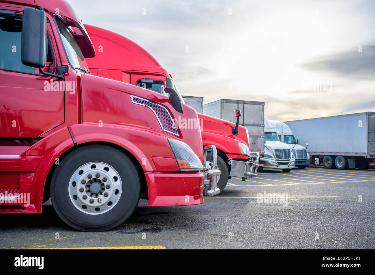 Industrial big rigs semi truck tractors with loaded semi trailers ...