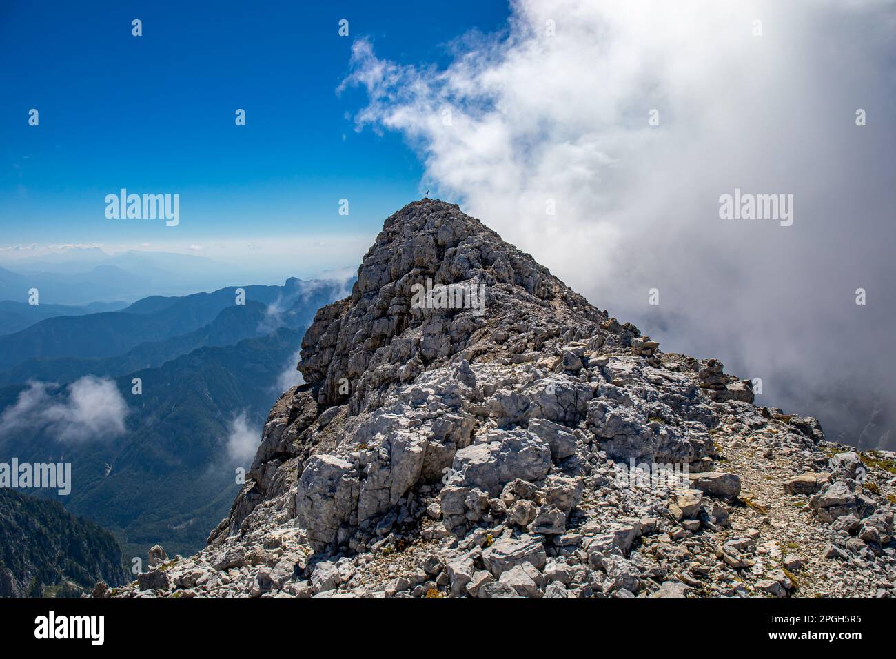 Cross up in the Alps mountains Stock Photo - Alamy