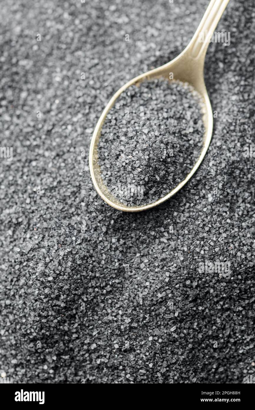 Hawaiian black lava sea salt . Healthy food concept. Speciality salt ...