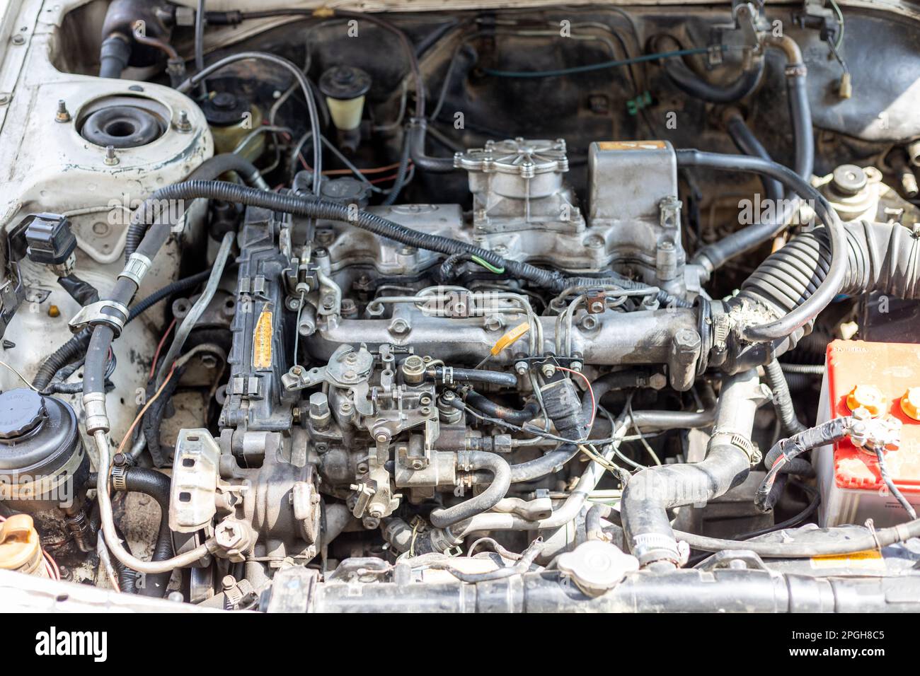 Old diesel engine repair work in a garage Stock Photo - Alamy