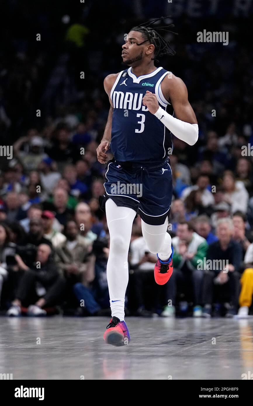 Dallas Mavericks guard Jaden Hardy jogs up court during an NBA ...