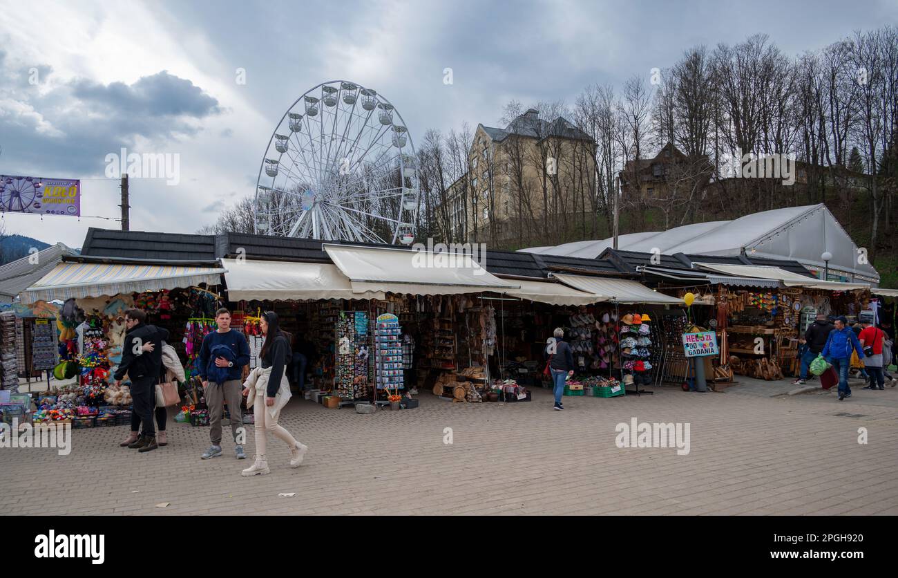 View of Souvenir shops on the streets selling winter clothes, colorful ...
