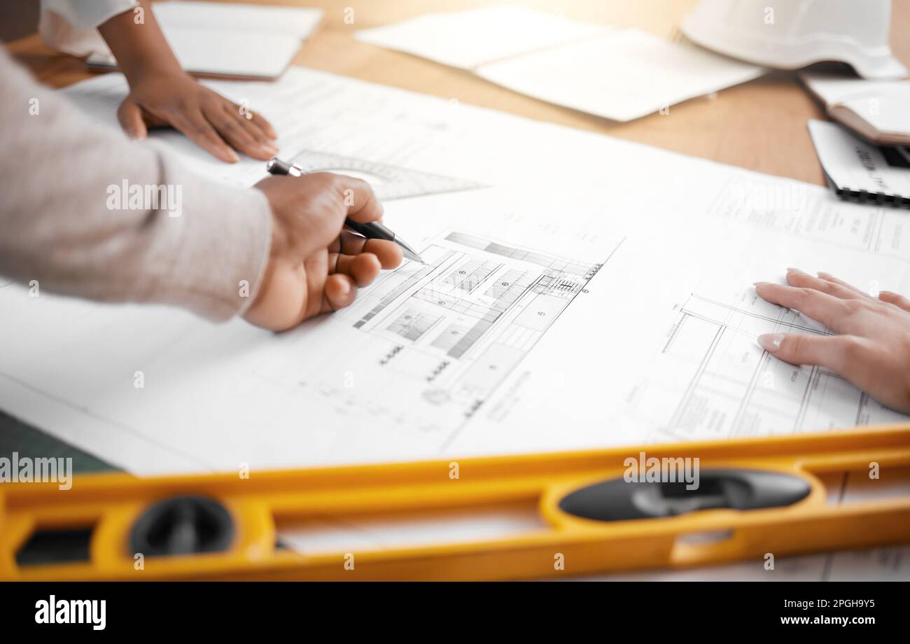 Hands, collaboration and planning with an architecture team working in ...