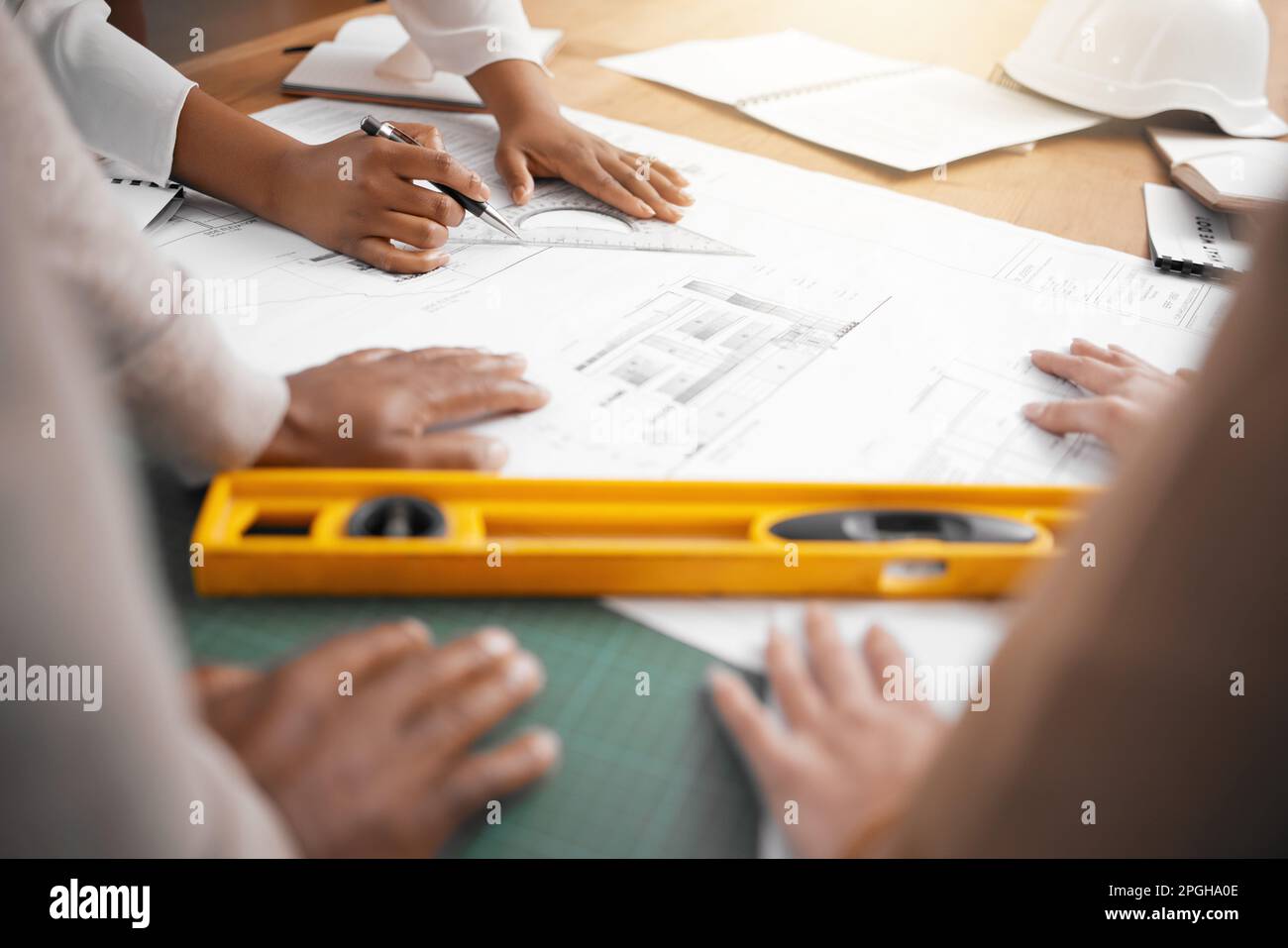 Hands, collaboration and design with a architecture team working in ...