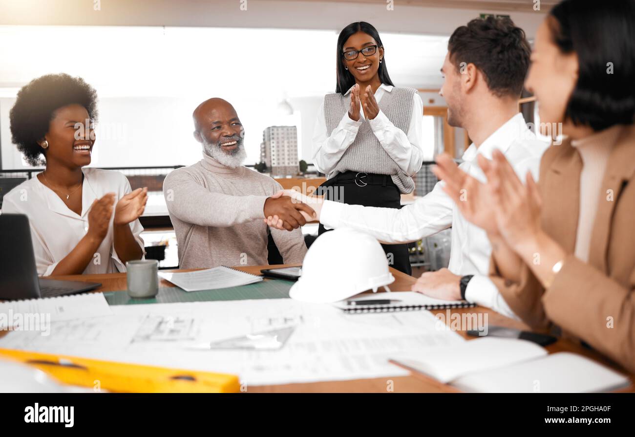 Handshake, meeting and team of architecture people clapping ...